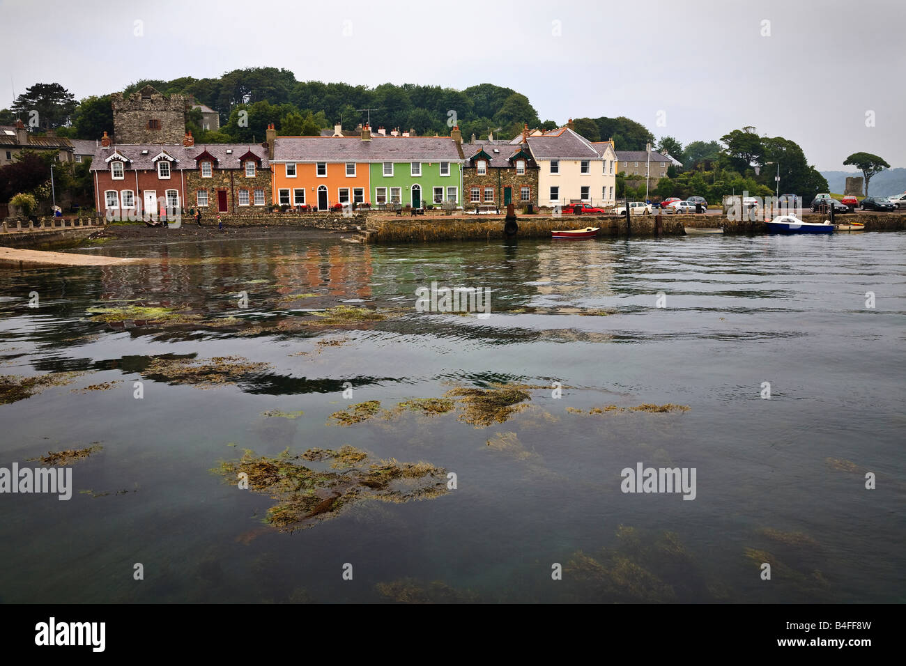 Brightly painted cottages at Strangford harbour, County Down, Northern ...