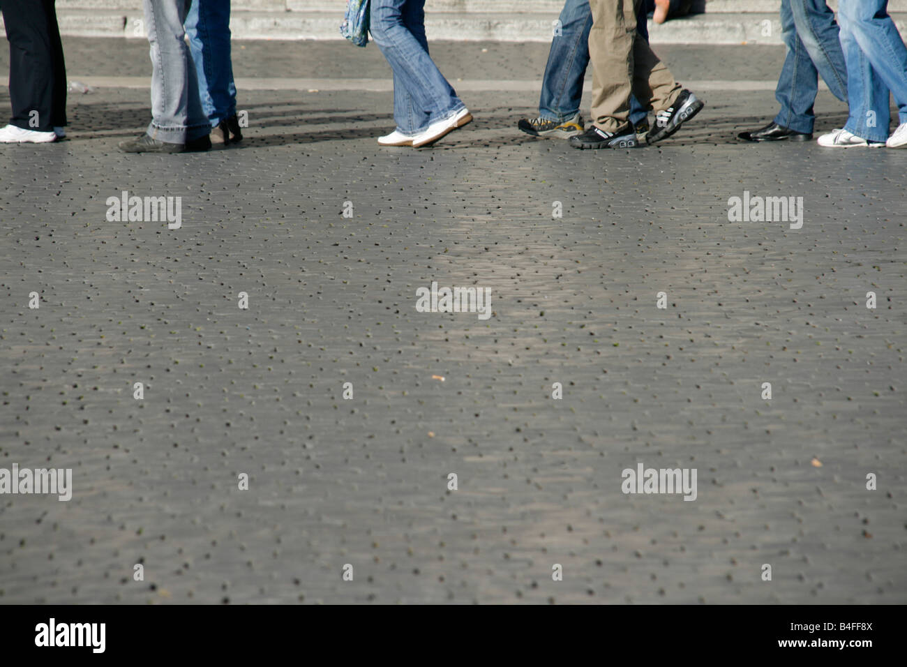 people standing in a queue in town Stock Photo - Alamy