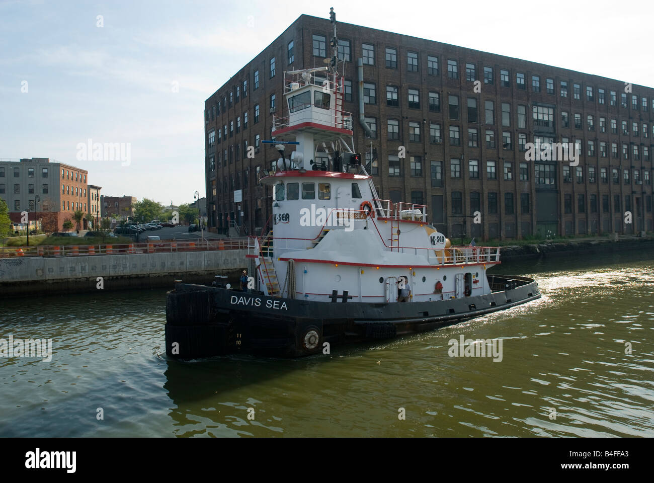 The tugboat Davis Sea travels into Newtown Creek an industrial waterway ...