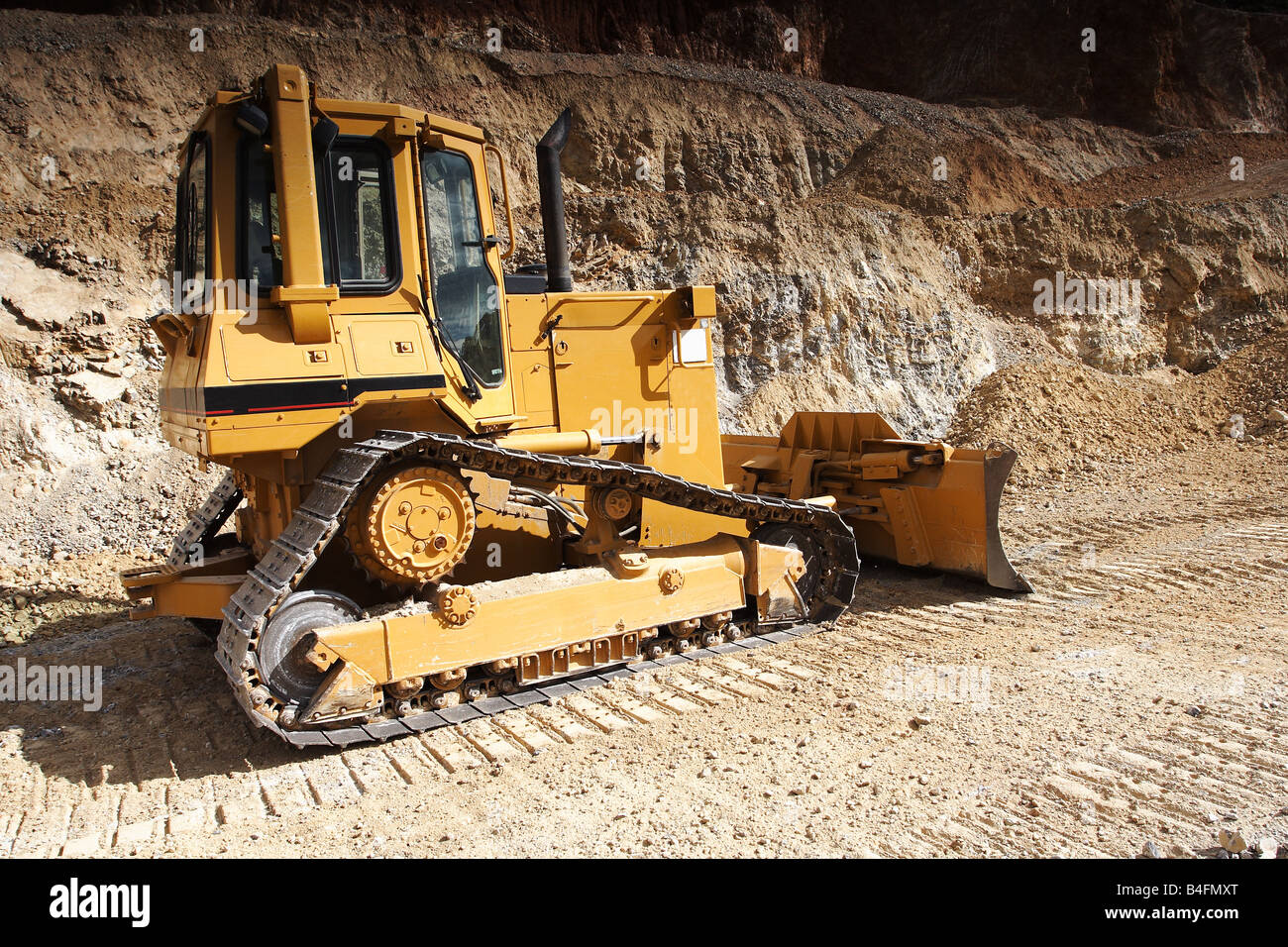 Bulldozer at construction yard Stock Photo - Alamy