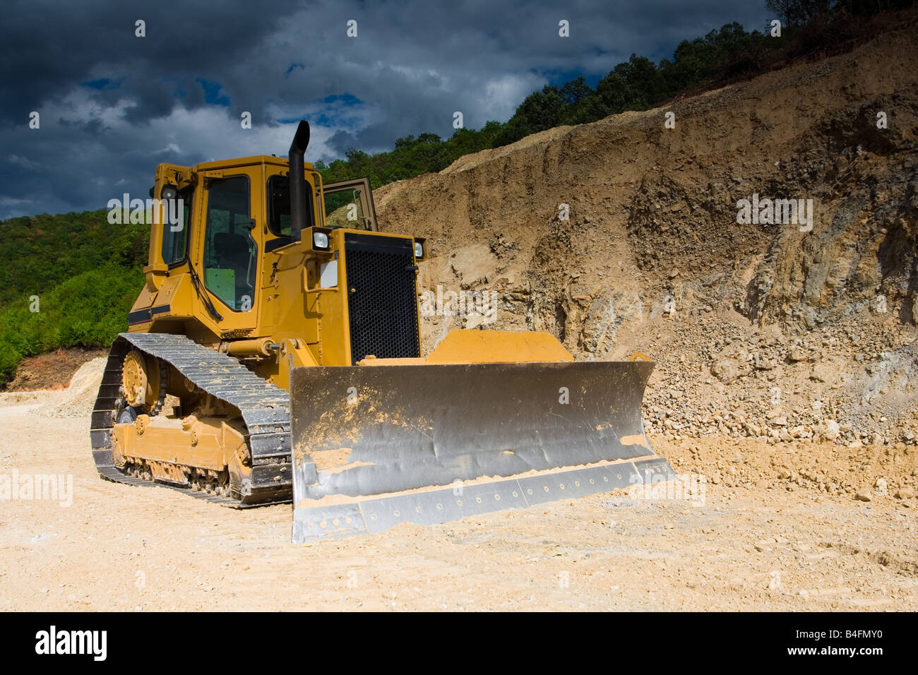 Bulldozer at construction yard Stock Photo - Alamy