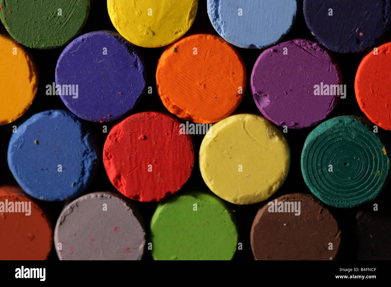 colour wall, round crayons Stock Photo - Alamy