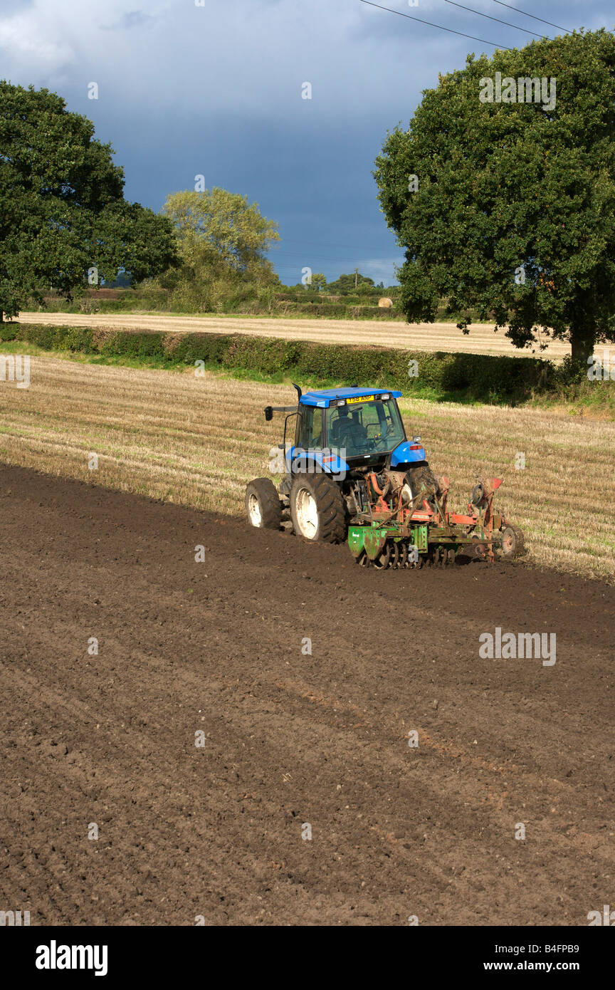 Ploughing up a stubble field ready to plant Barley with a New Holland ...