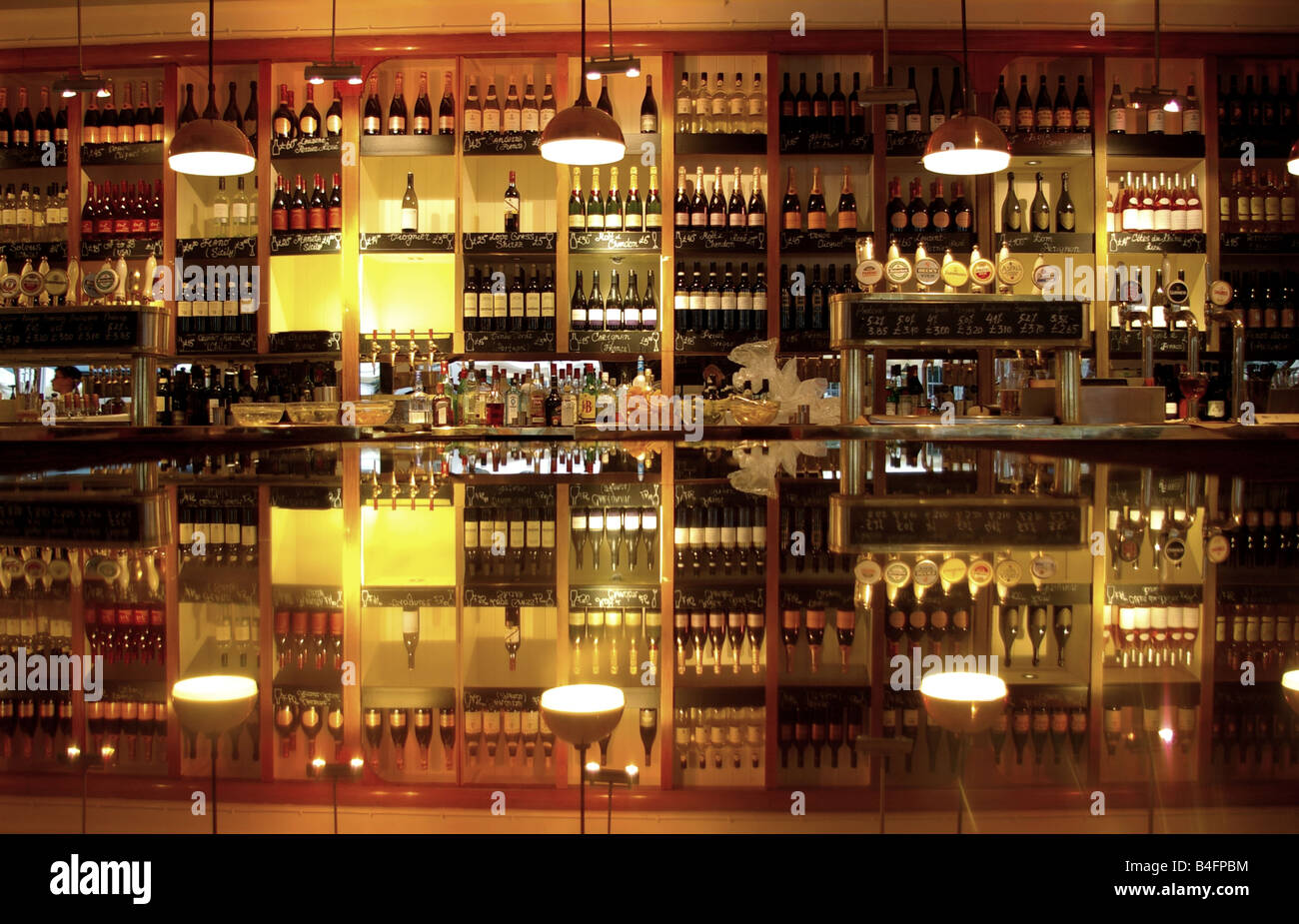 Reflection of bar in branch of All Bar One in London Stock Photo - Alamy