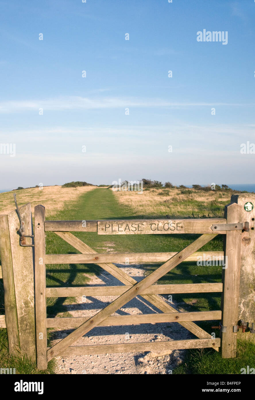 Wooden gate the Dorset coastal path between Swanage and Poole Dorset ...