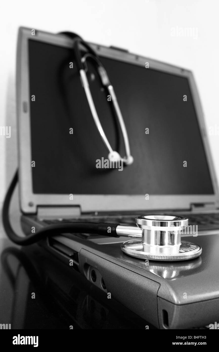 Laptop and stethoscope Stock Photo - Alamy