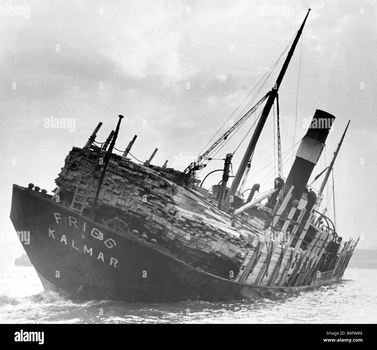 The feighter Frigg seen here with a 24 degree list to starboard after ...