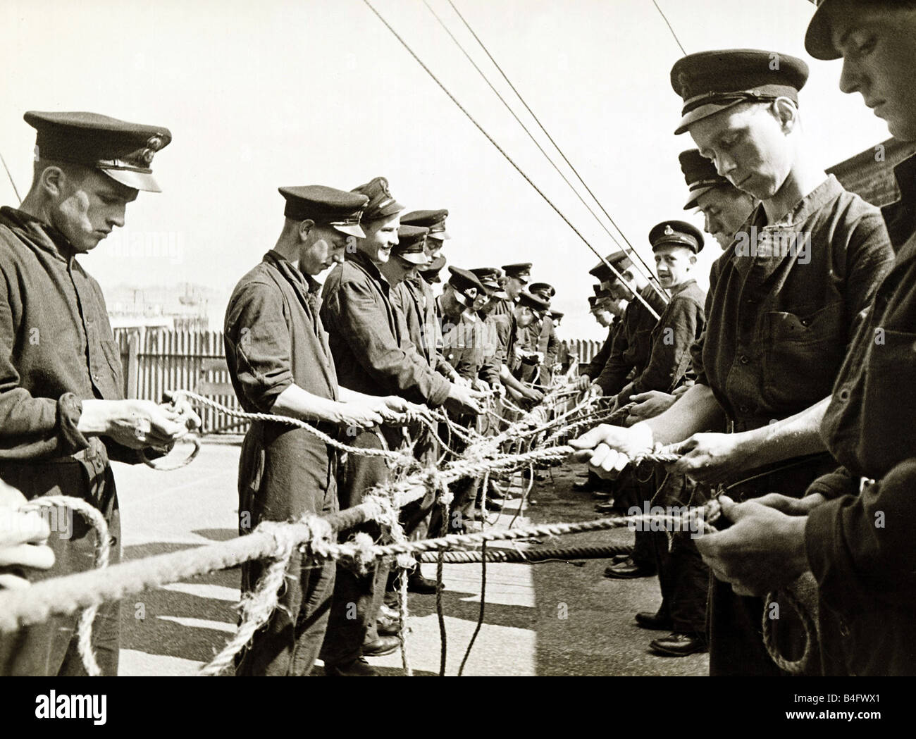Young Sailors learning skills September 1942 standing in line tying ...