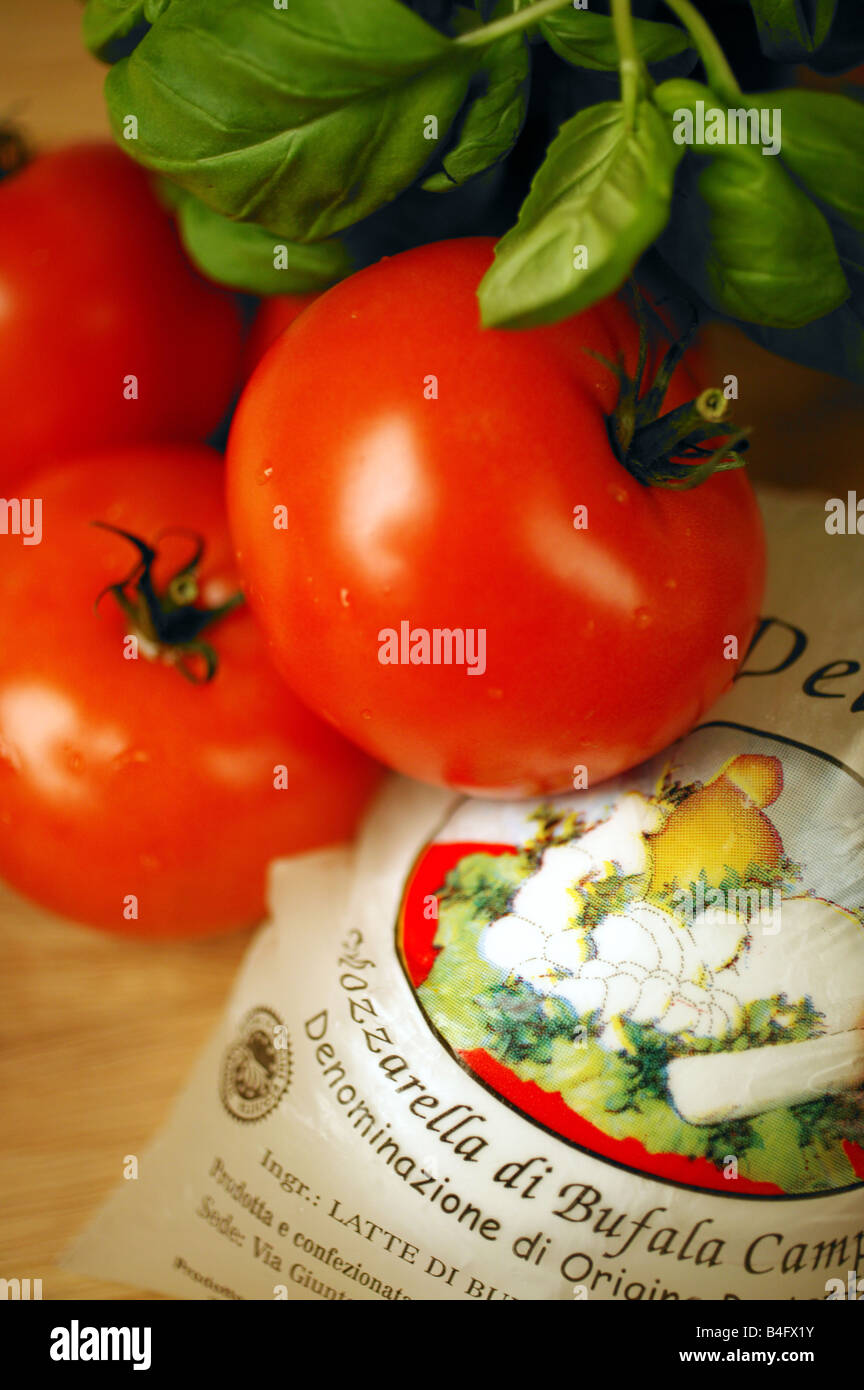 Tomatoes, buffalo mozzarella salad with basil Stock Photo - Alamy