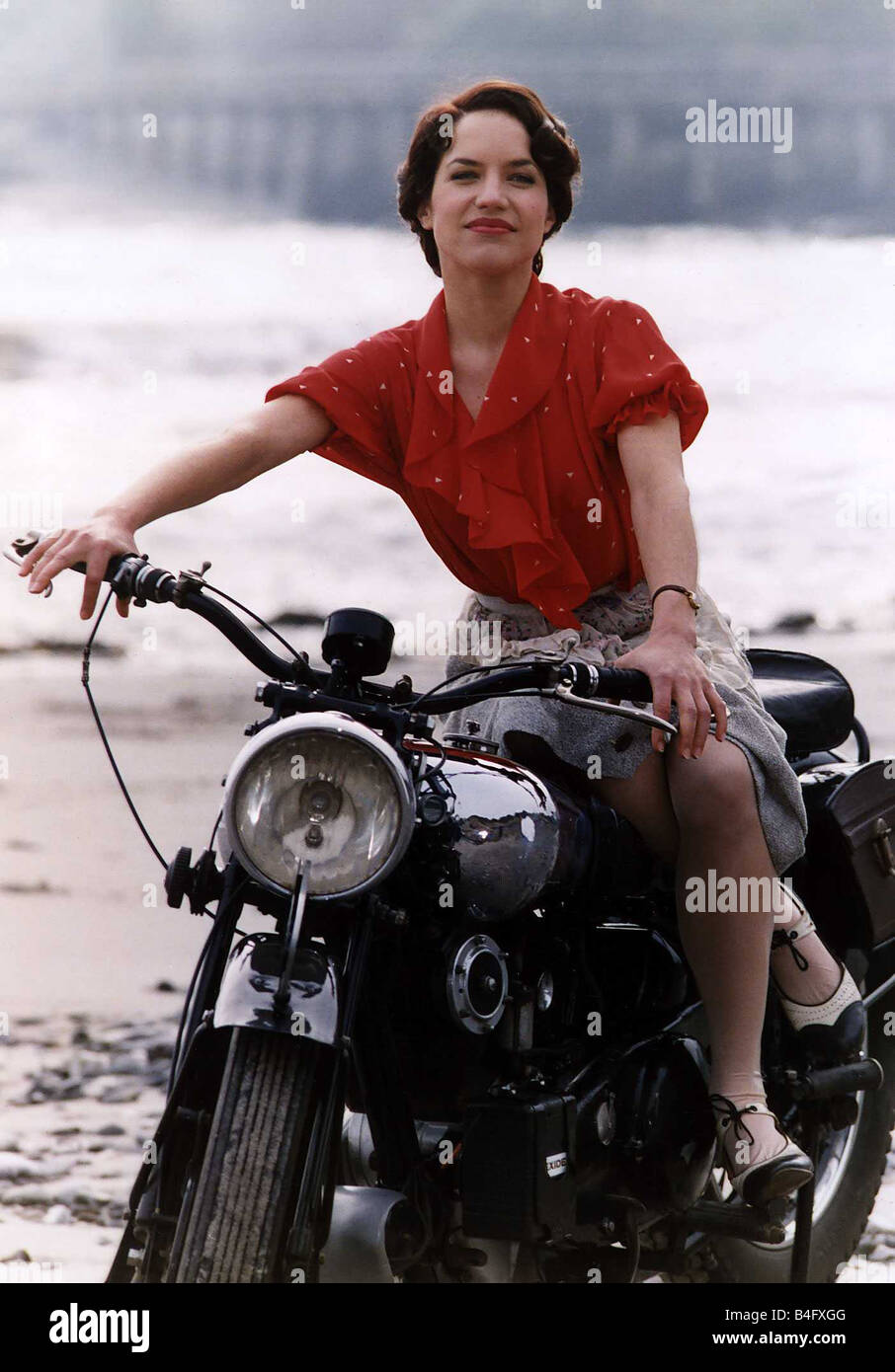 Jennifer Calvert actress siitting astride a motorcycle Appearing in the ...