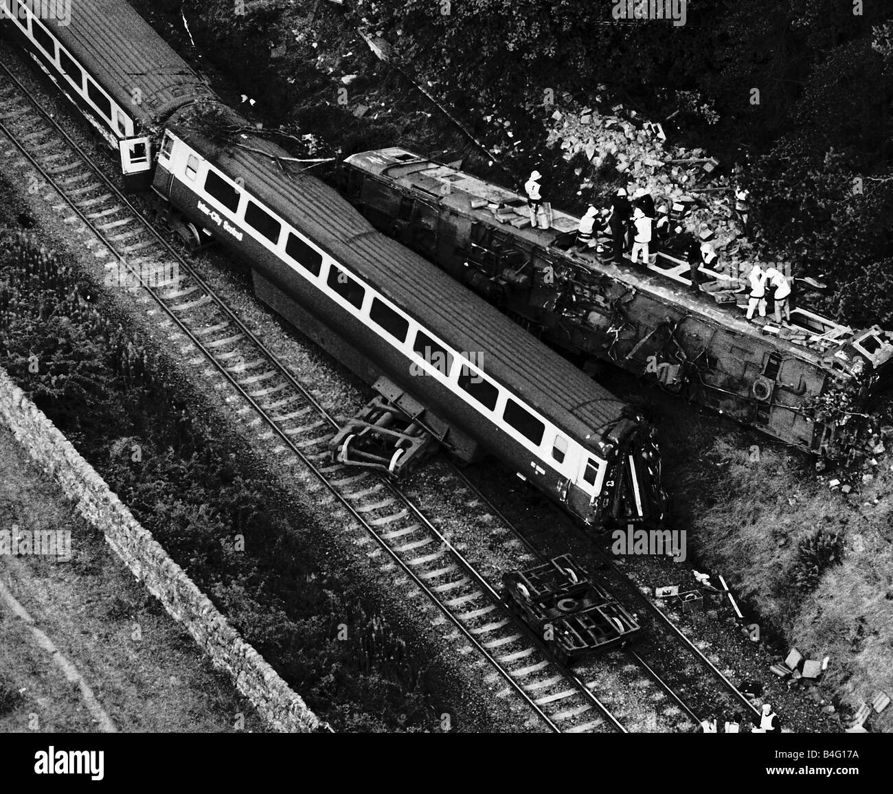 Derailed coaches from the Polmont rail crash lay on their sides on the ...