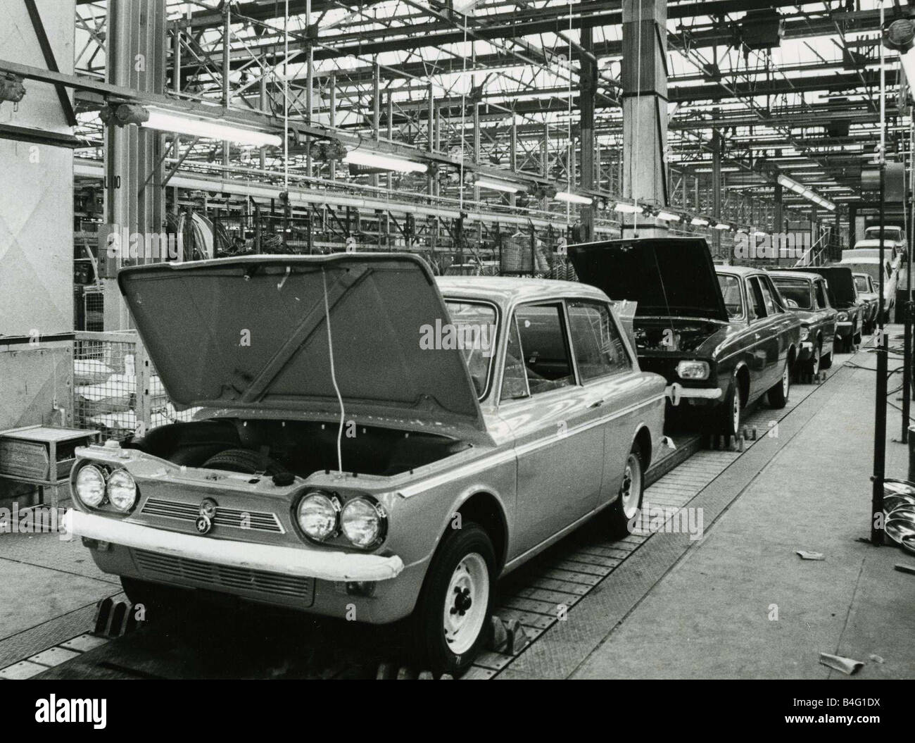 Production line with Hillman Imp and Hillman Hunter cars being ...