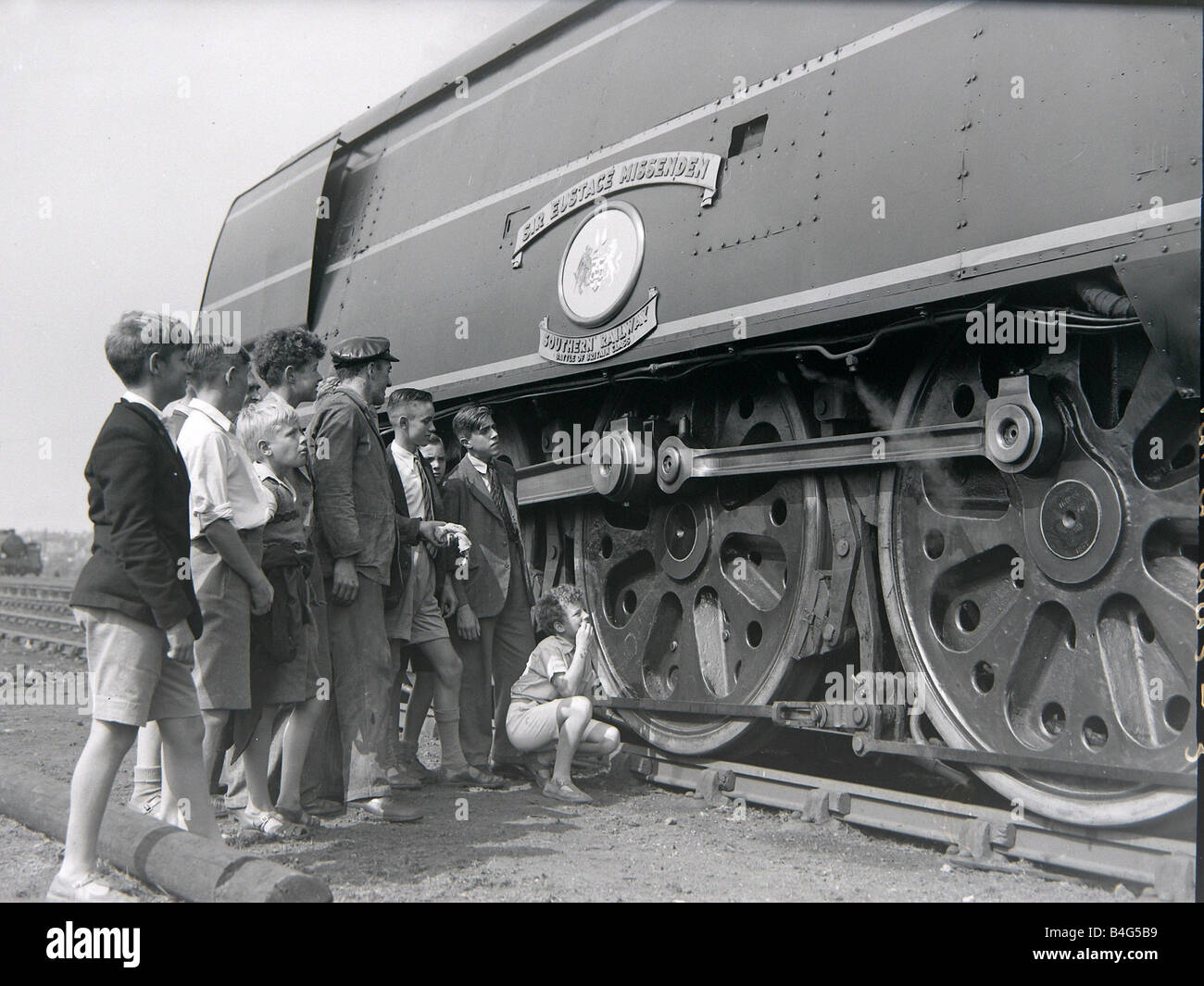 Small boys admire the Battle of Britain class steam locomotive during ...