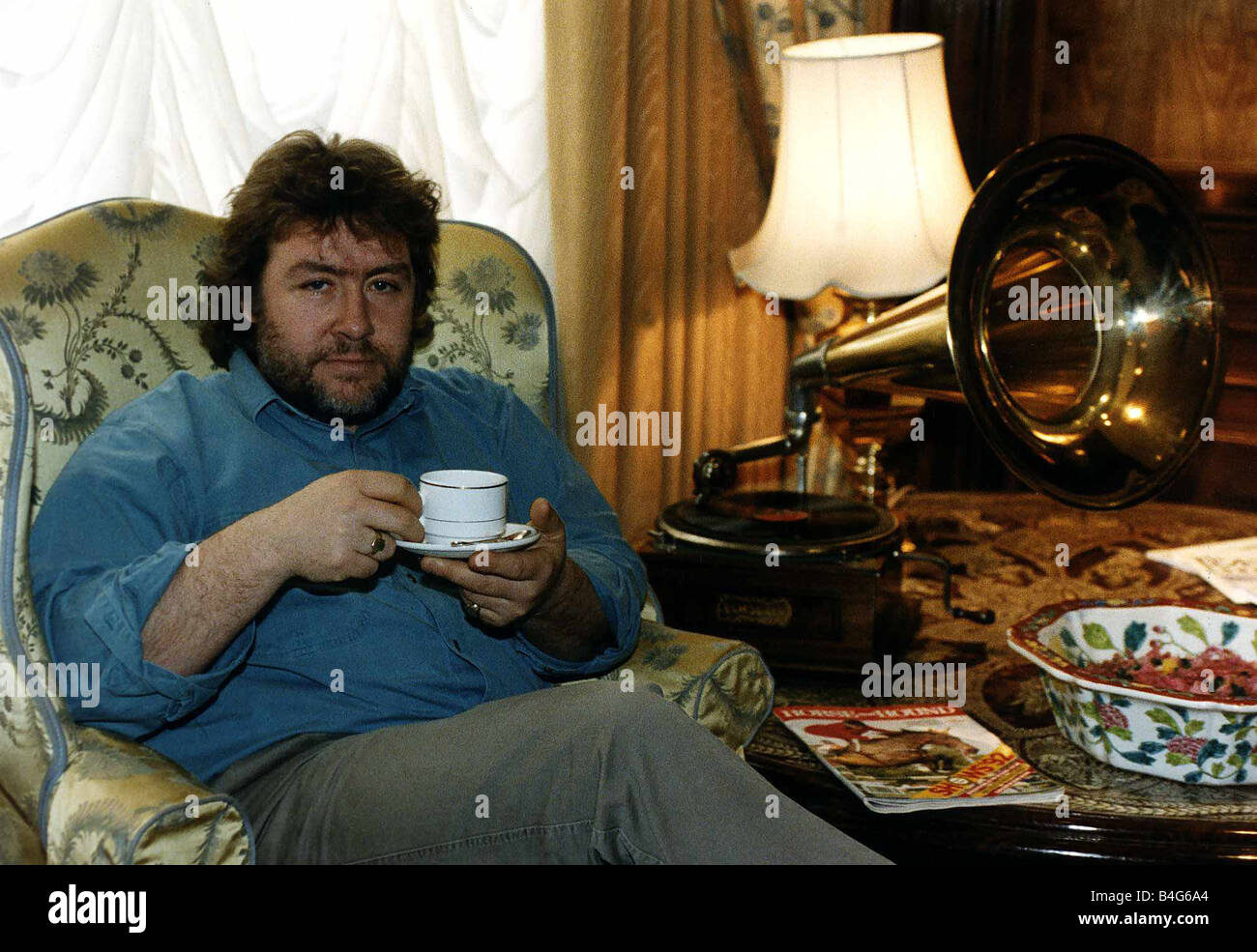 Gregor Fisher Actor Star of Rab C Nesbittsitting in chair drinking a ... Gregor Fisher Actor Star of Rab C Nesbittsitting in chair drinking a ...