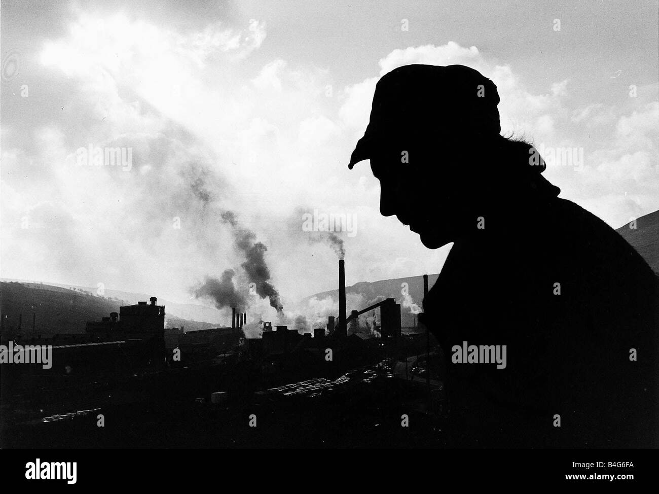 A Welsh steelworker on his way home from the British steel works at ...