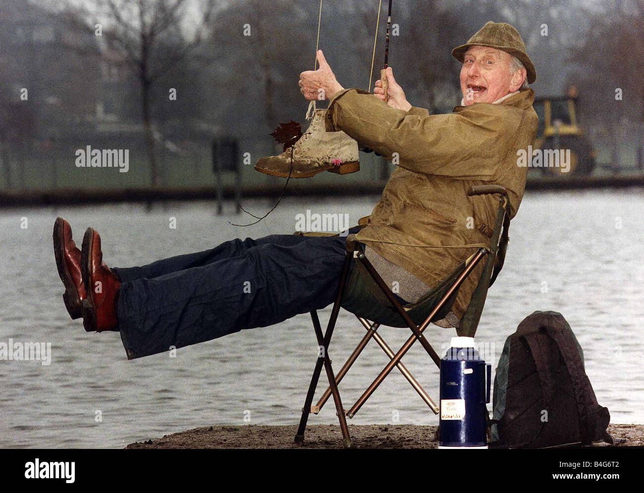 Norman Lumsden Actor sitting down doing a spot of fishing Stock Photo ...