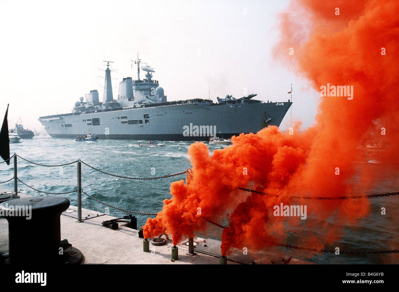Smoke from flares welcomes HMS Invincible return to Portsmouth from the ...