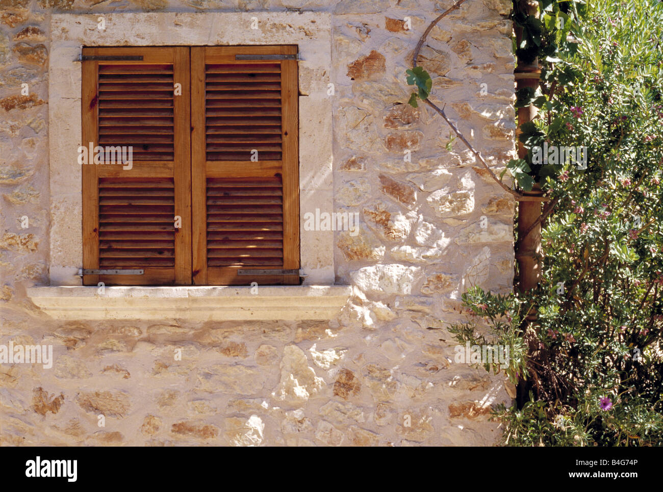 Sunlight and shade on shutters of finca window in Mallorca Stock Photo ...