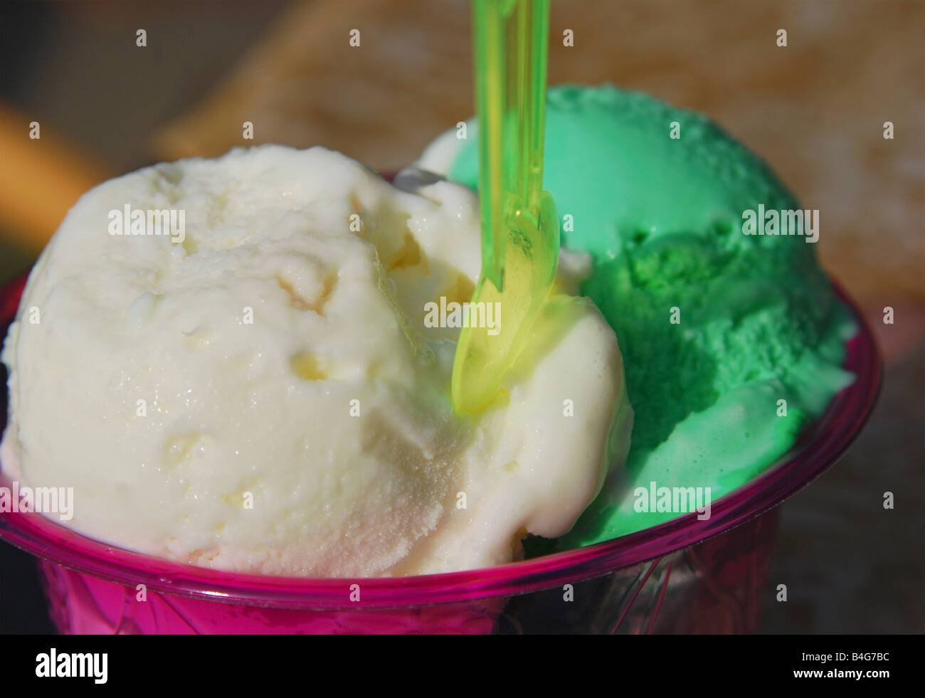 ice cream ball with plastic spoon Stock Photo - Alamy