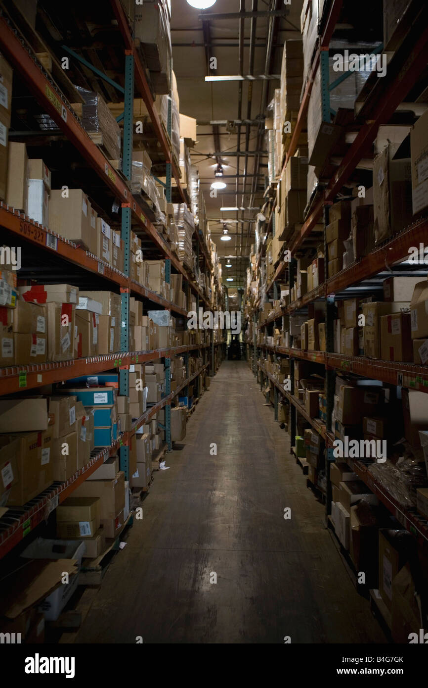 Parcels on shelves in a factory Stock Photo - Alamy