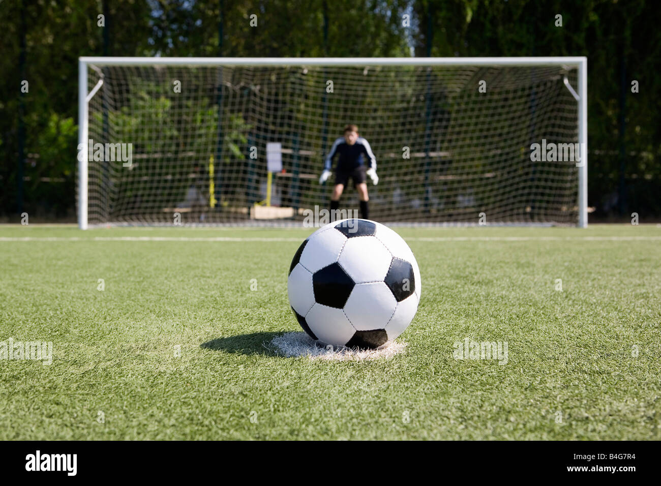 A soccer ball on a soccer field Stock Photo - Alamy