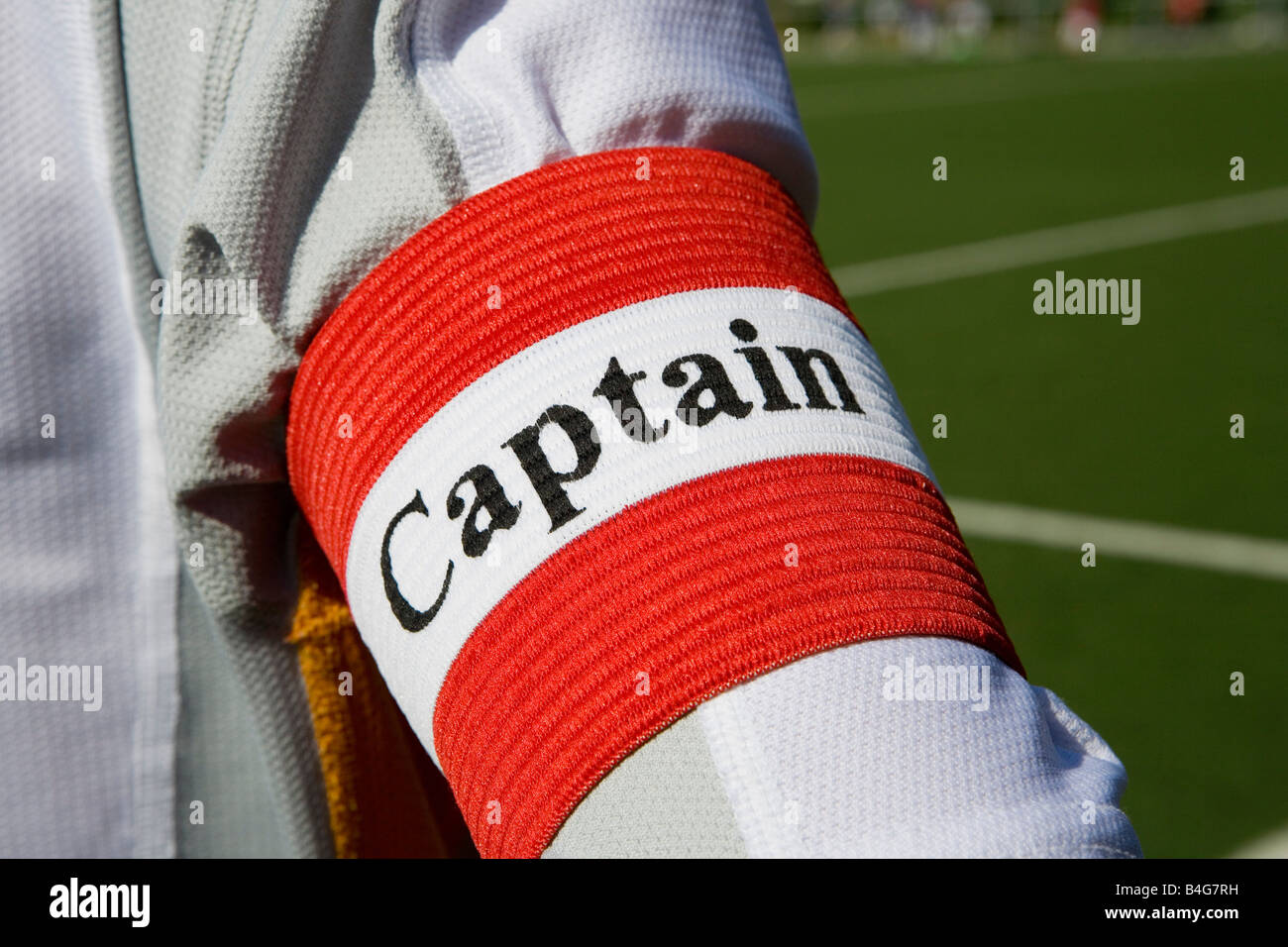 A person wearing a 'captain' arm band Stock Photo - Alamy