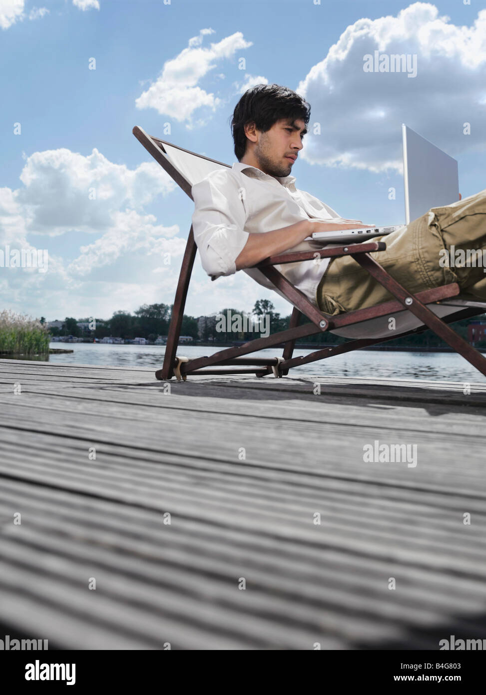 Man Sitting On Dock High Resolution Stock Photography and Images - Alamy