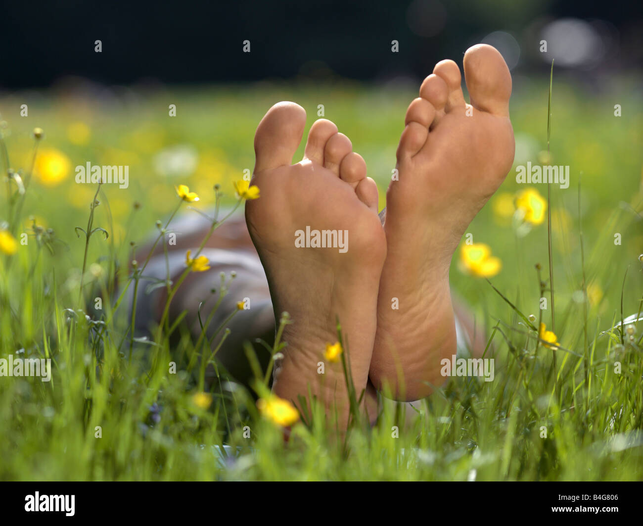 The soles of a person's bare feet, close up Stock Photo - Alamy