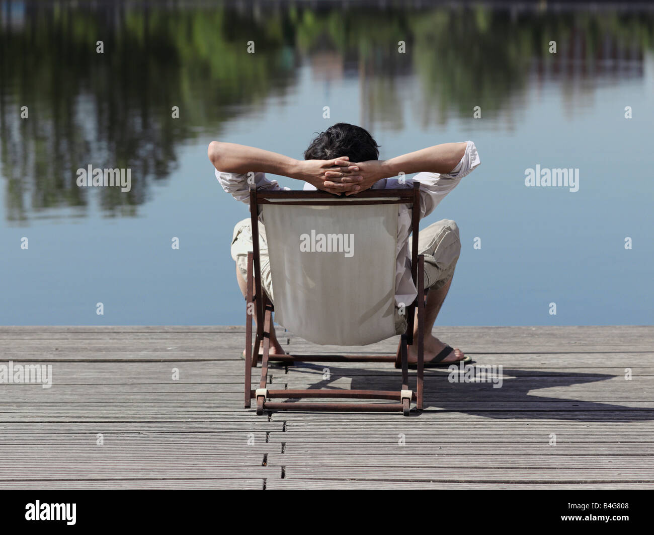 Man sitting from above shadow hi-res stock photography and images - Alamy