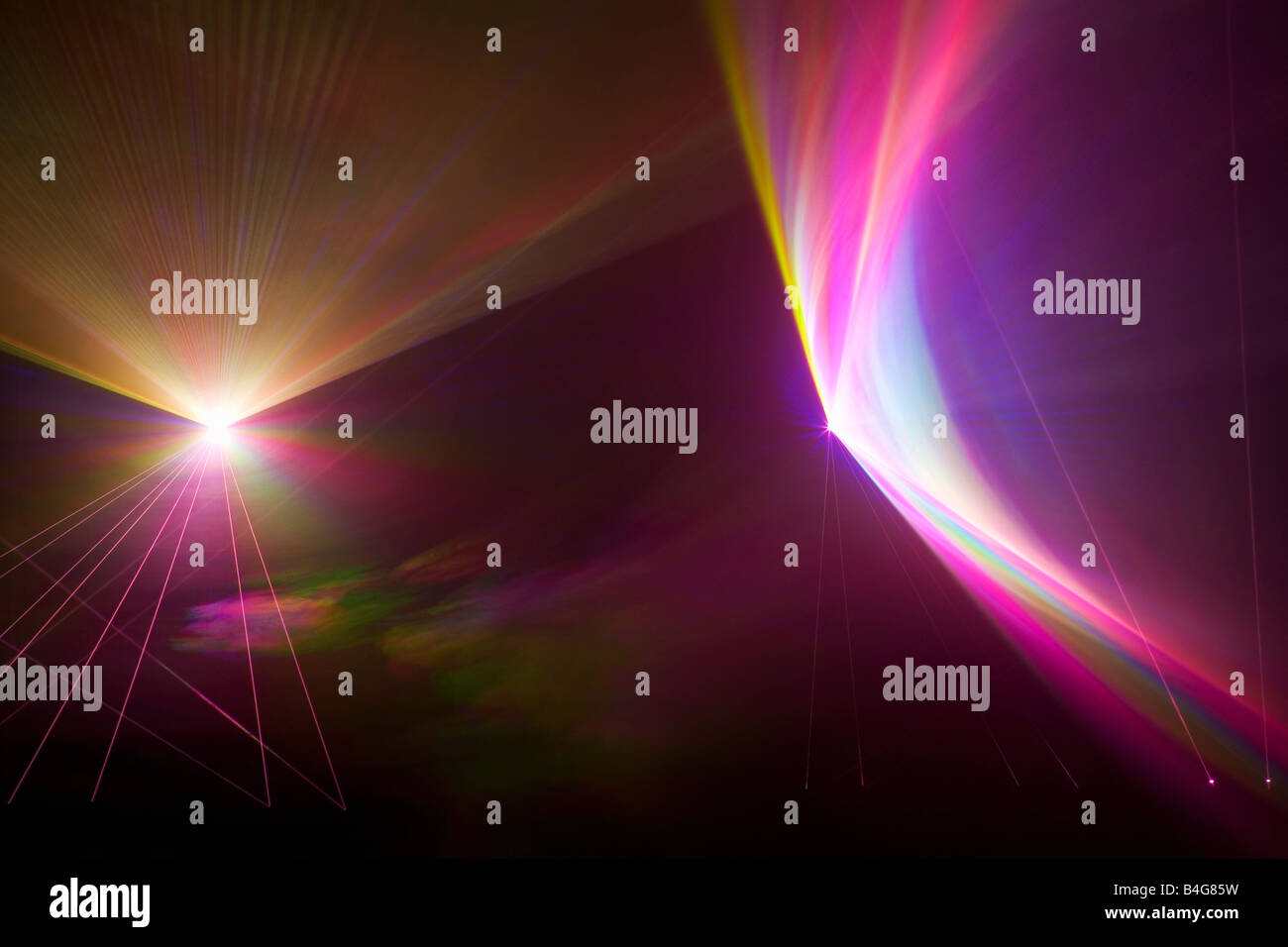 Multi colored laser lights Stock Photo - Alamy