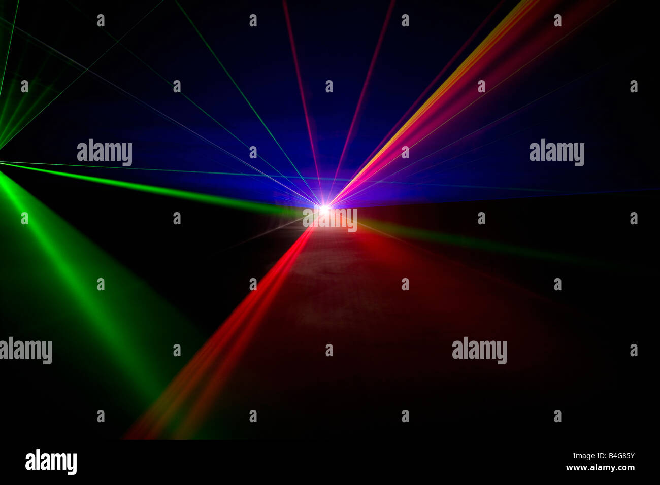 Multi colored laser lights Stock Photo - Alamy