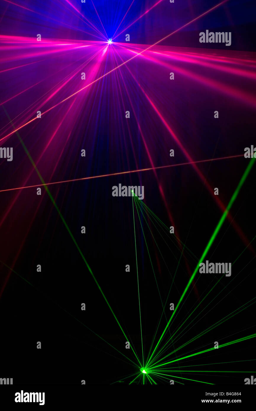 Multi colored laser lights Stock Photo - Alamy