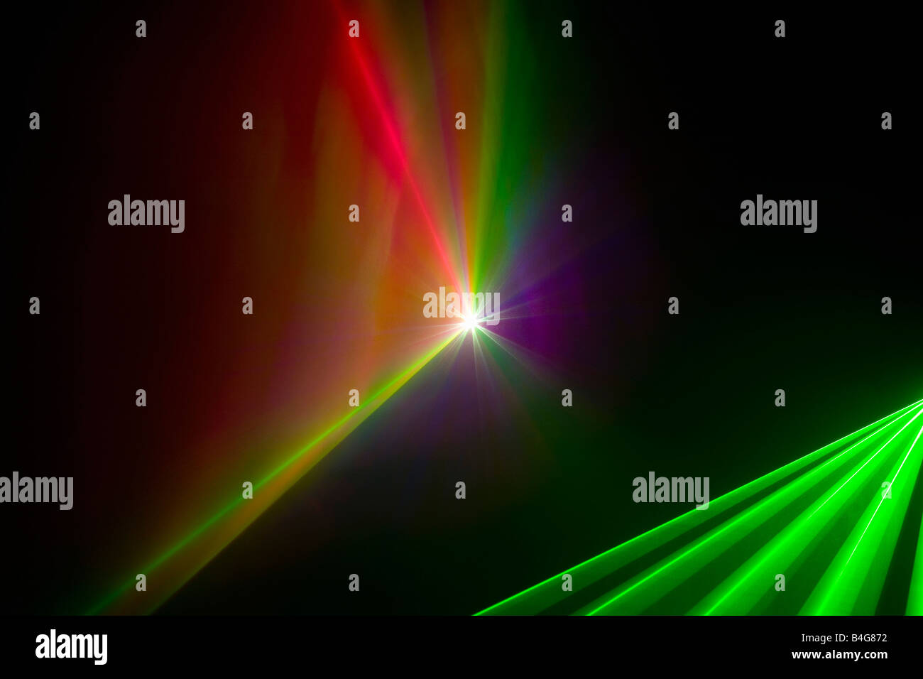 Multi colored laser lights Stock Photo - Alamy