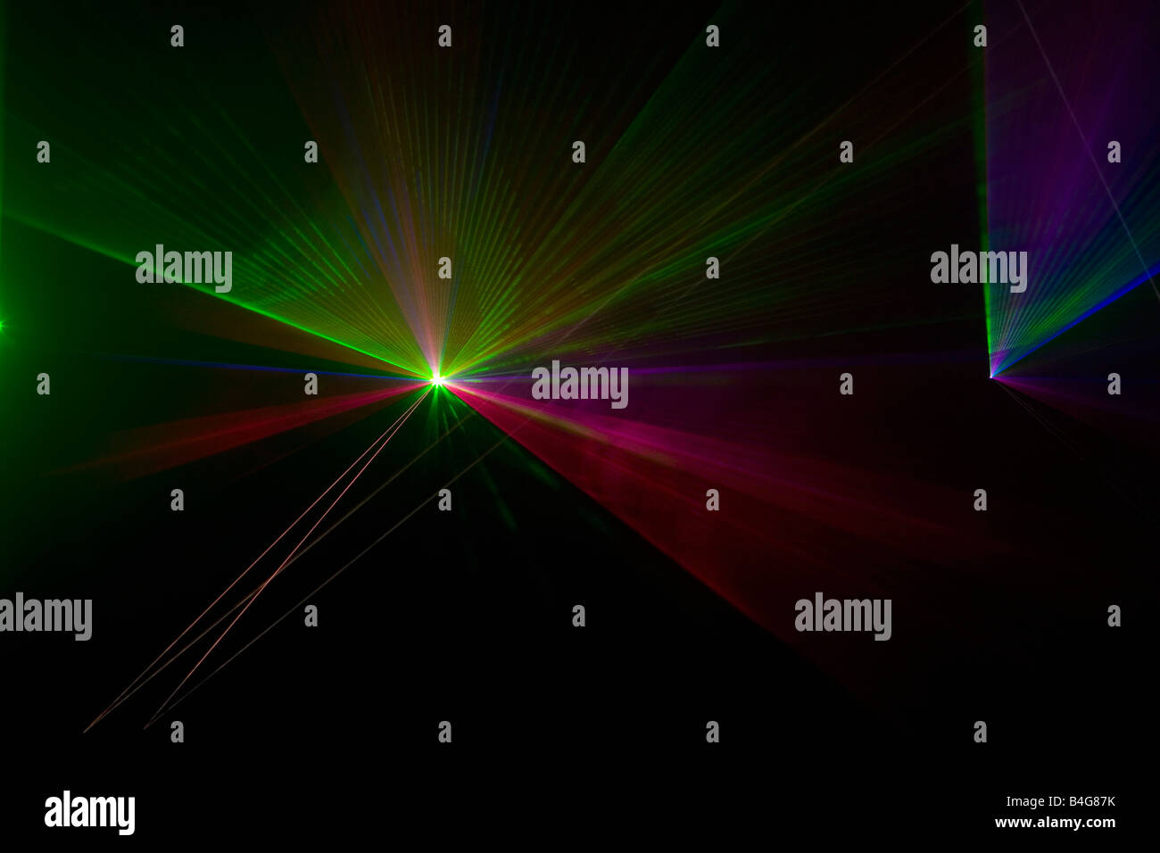 Multi colored laser lights Stock Photo - Alamy