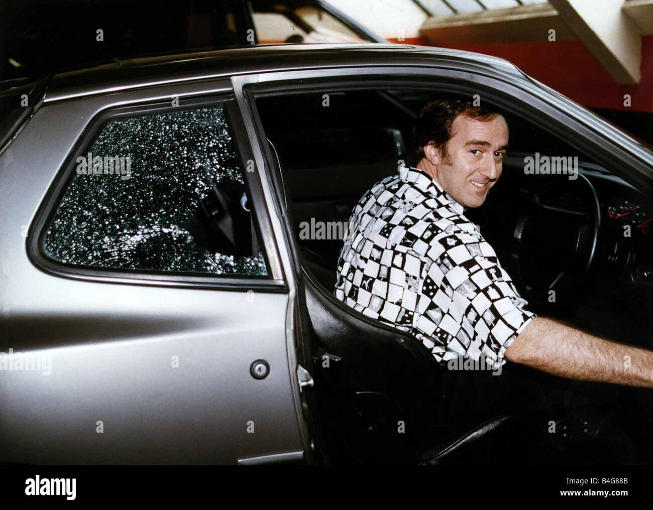 Angus Deayton Actor and TV Presenter gets into his car Stock Photo - Alamy