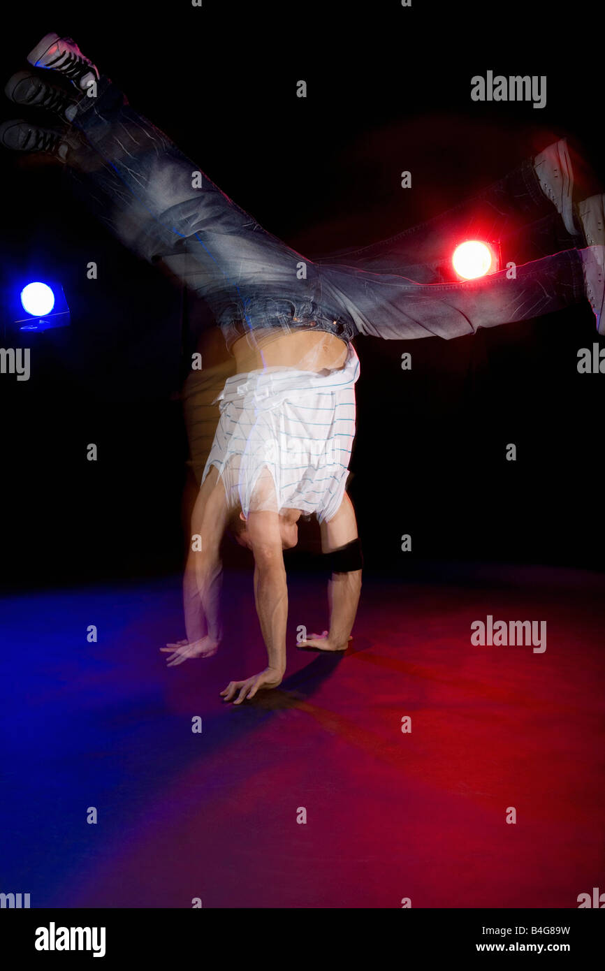 A B-boy doing a Flare breakdance move Stock Photo - Alamy