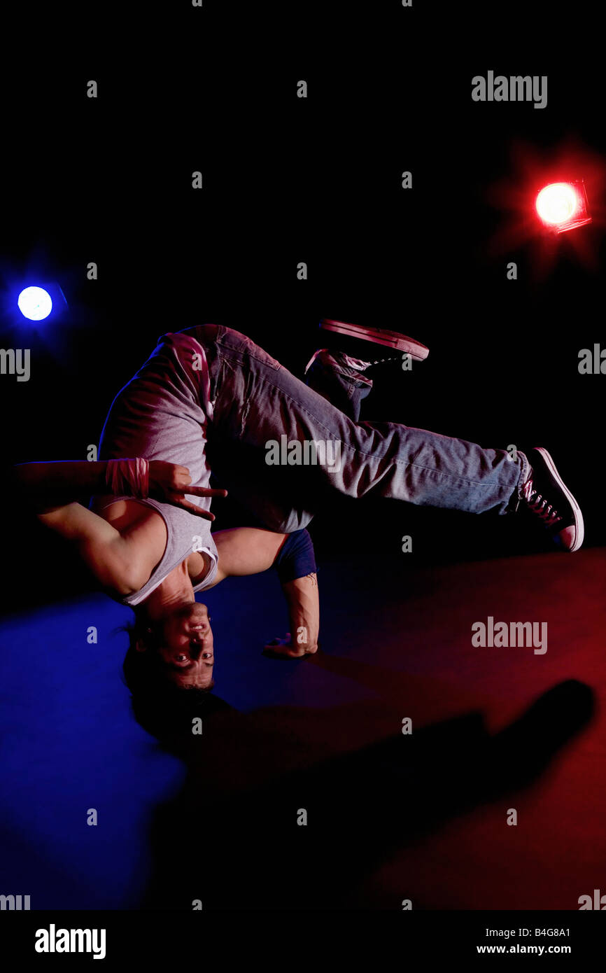 A B-boy doing a Headstand Freeze breakdance move Stock Photo - Alamy