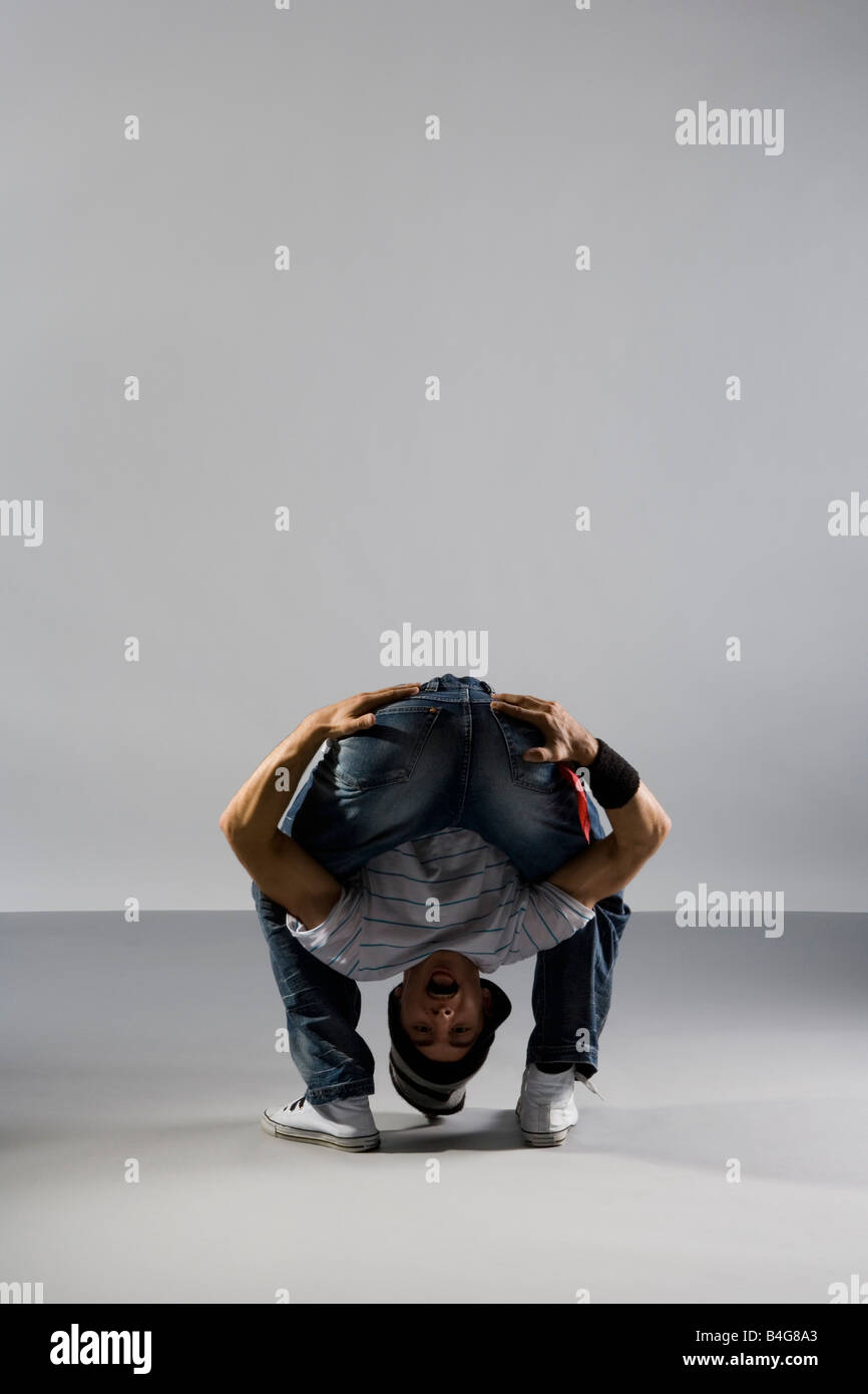 A B-boy doing a Freeze breakdance move Stock Photo - Alamy