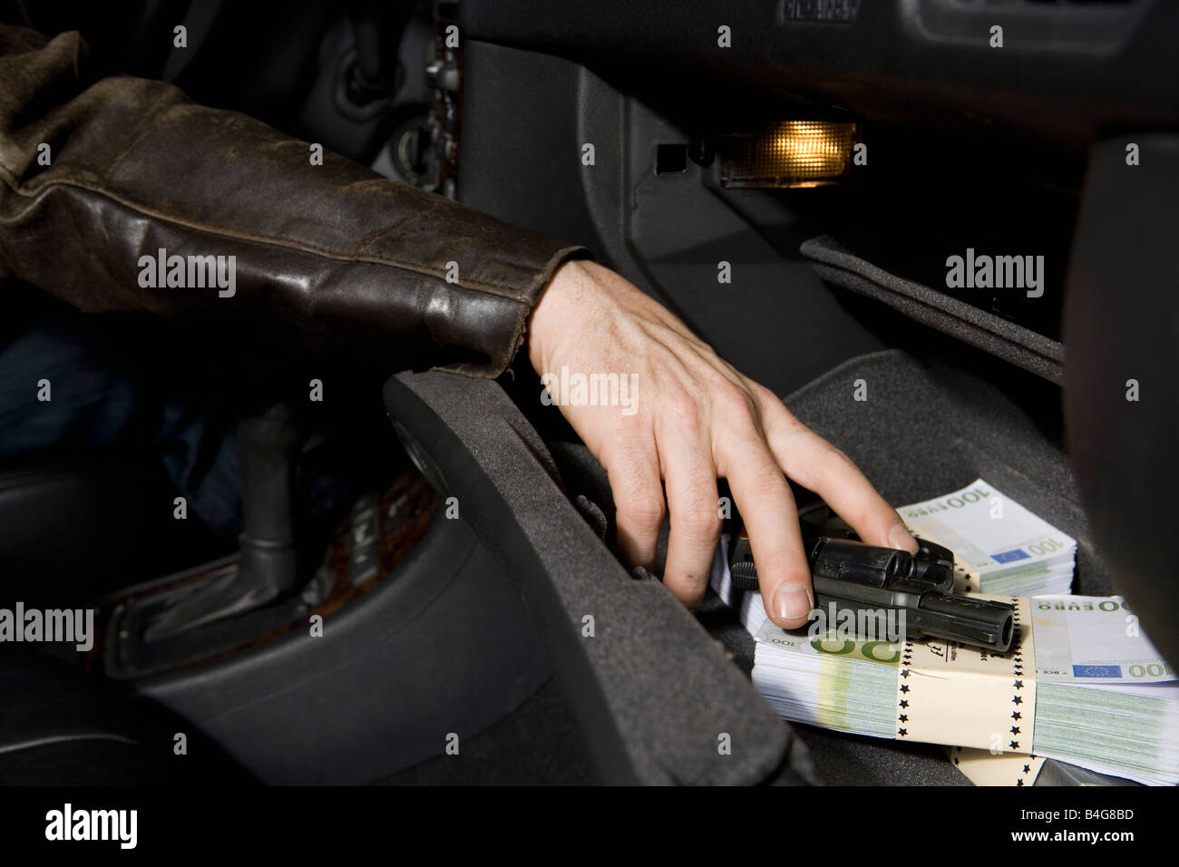 Mans hand holding gun hi-res stock photography and images - Alamy