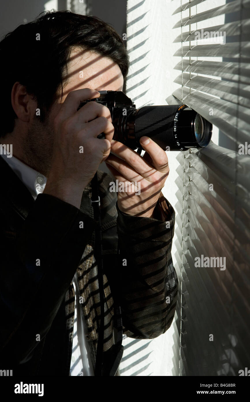 Spying Through Camera High Resolution Stock Photography and Images - Alamy