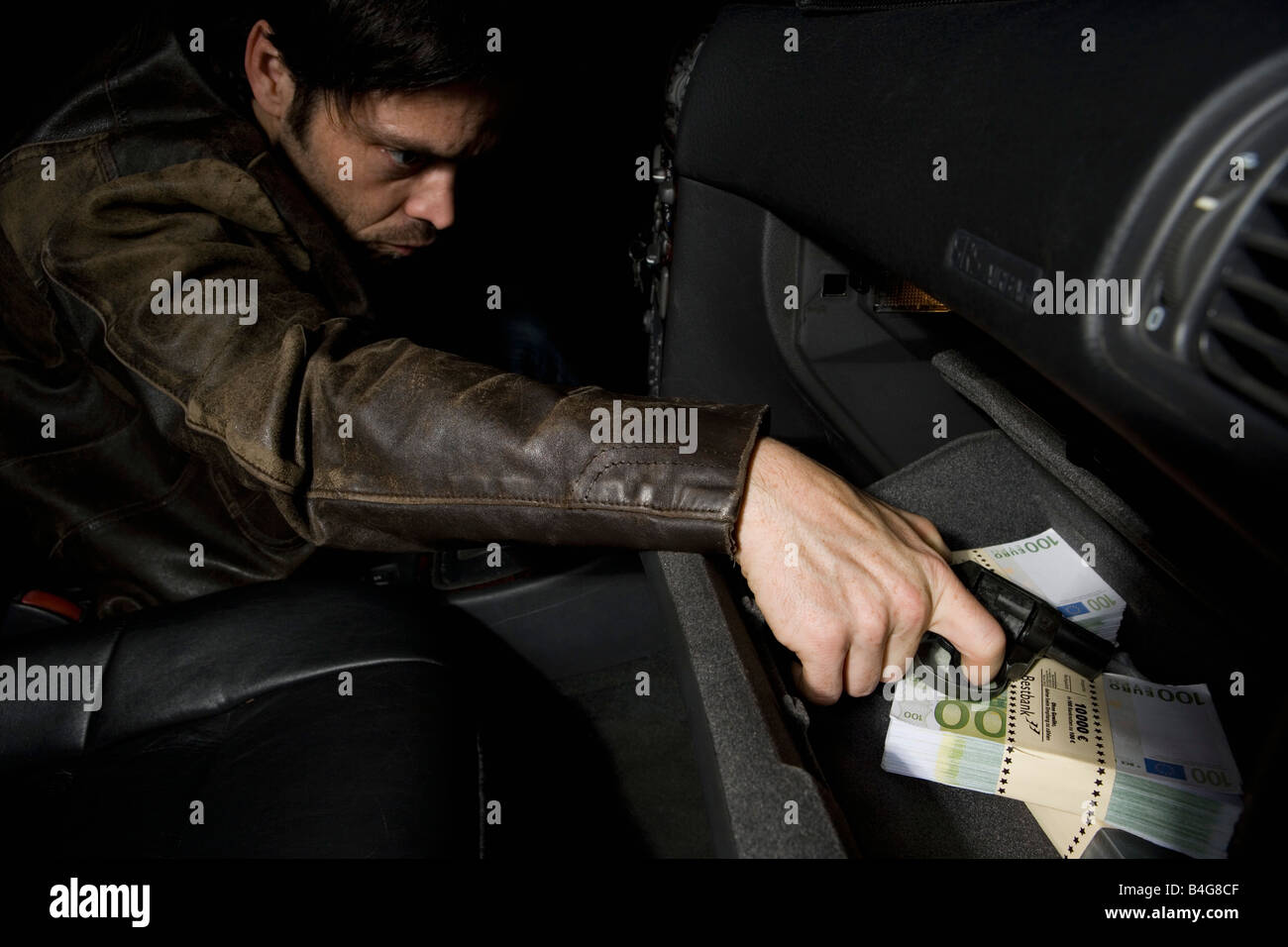 A man reaching for a gun Stock Photo - Alamy