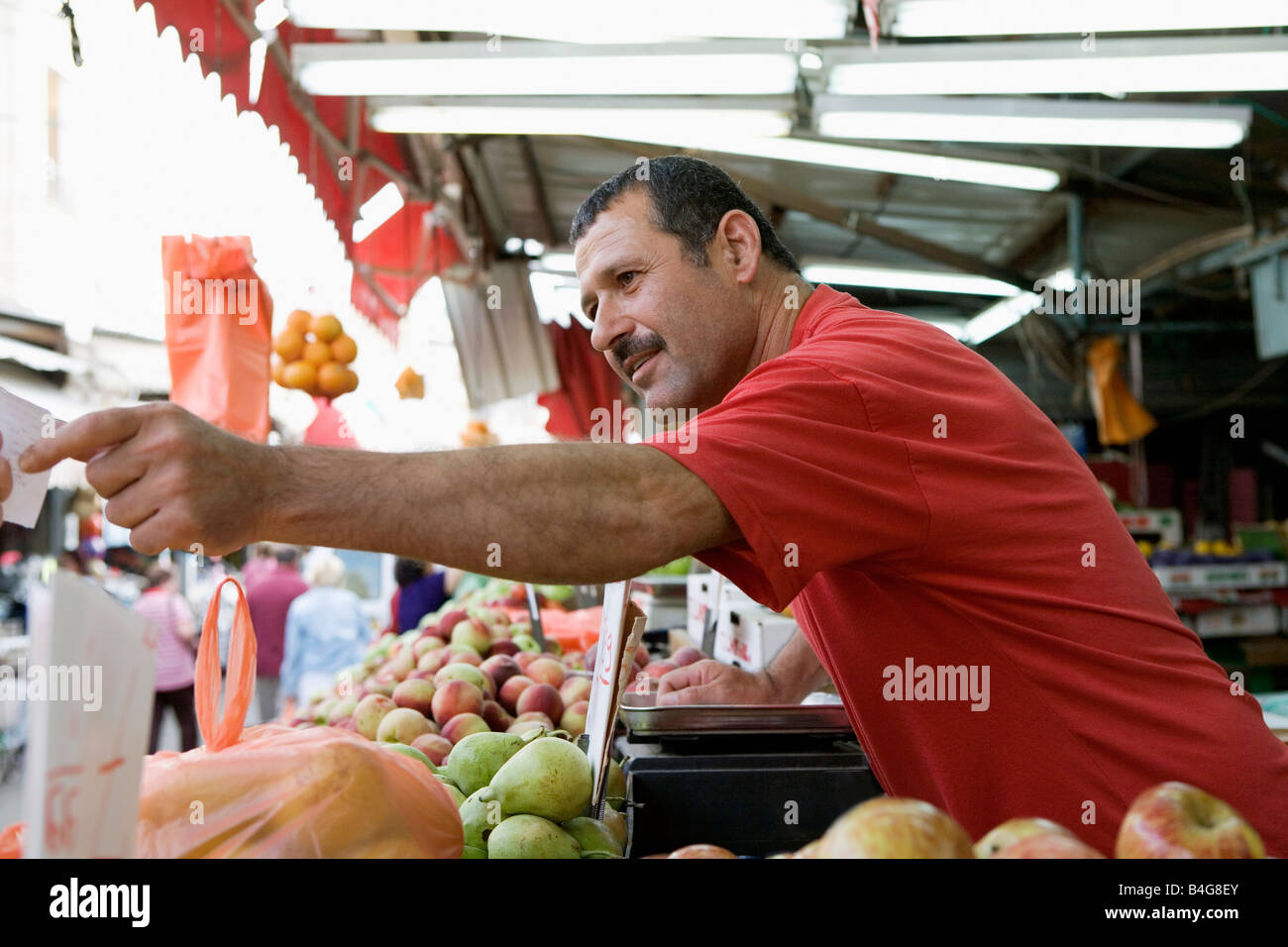 A market vendor Stock Photo - Alamy