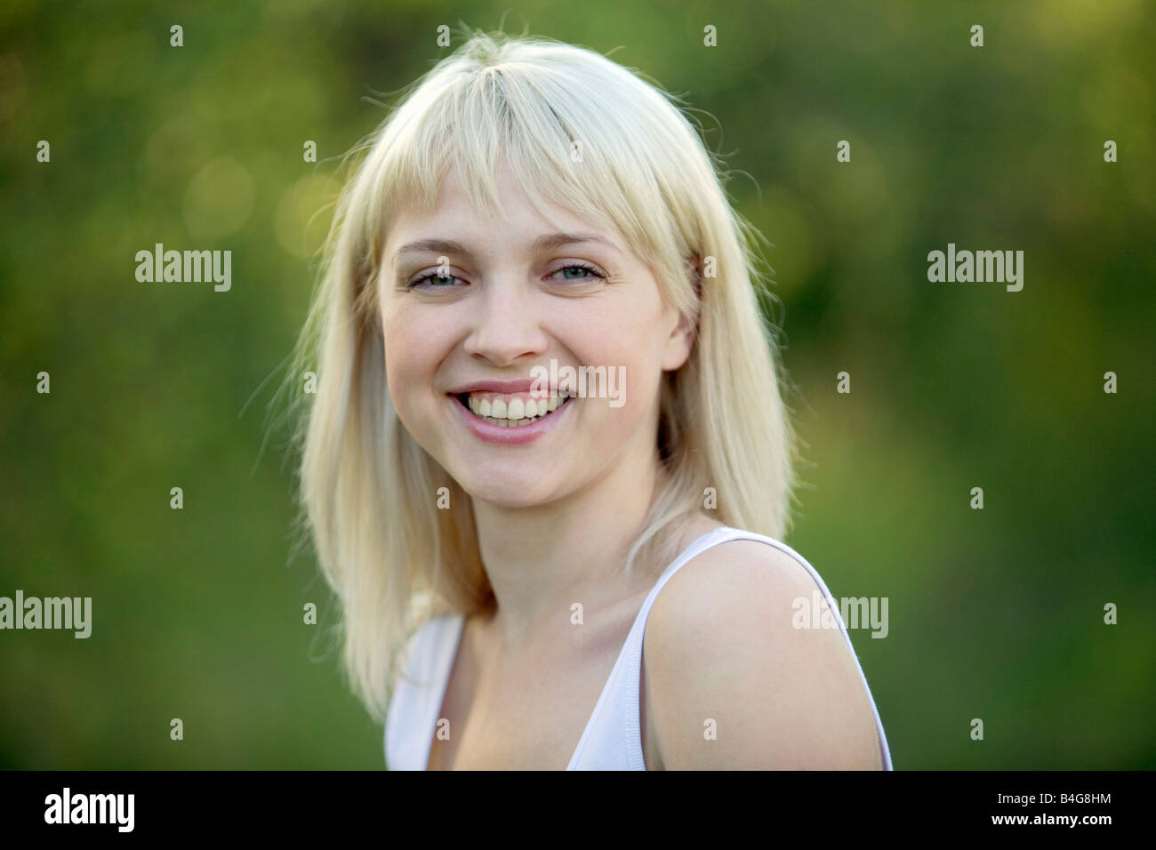 Portrait of a woman smiling Stock Photo - Alamy