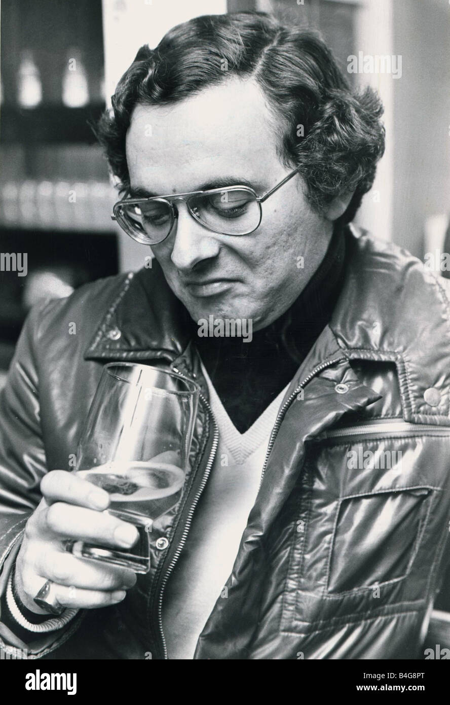 Man with a dodgy pint in a pub October 1976 Stock Photo - Alamy