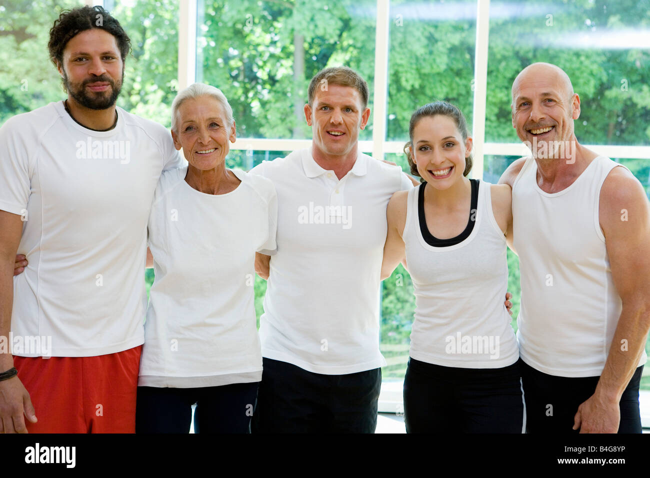 A group of people with their arms around each other Stock Photo - Alamy