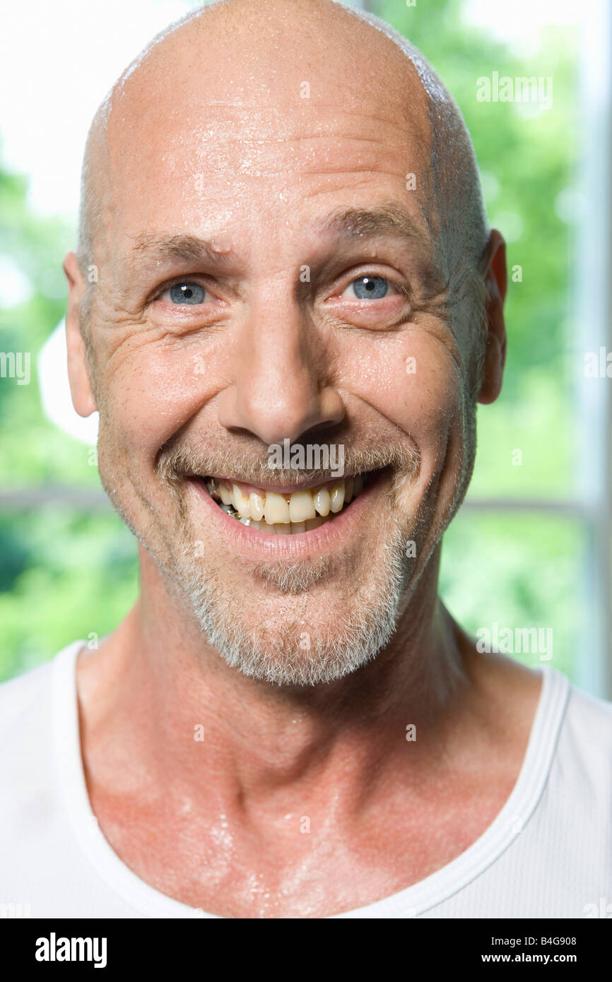 A mature man sweating, portrait Stock Photo - Alamy