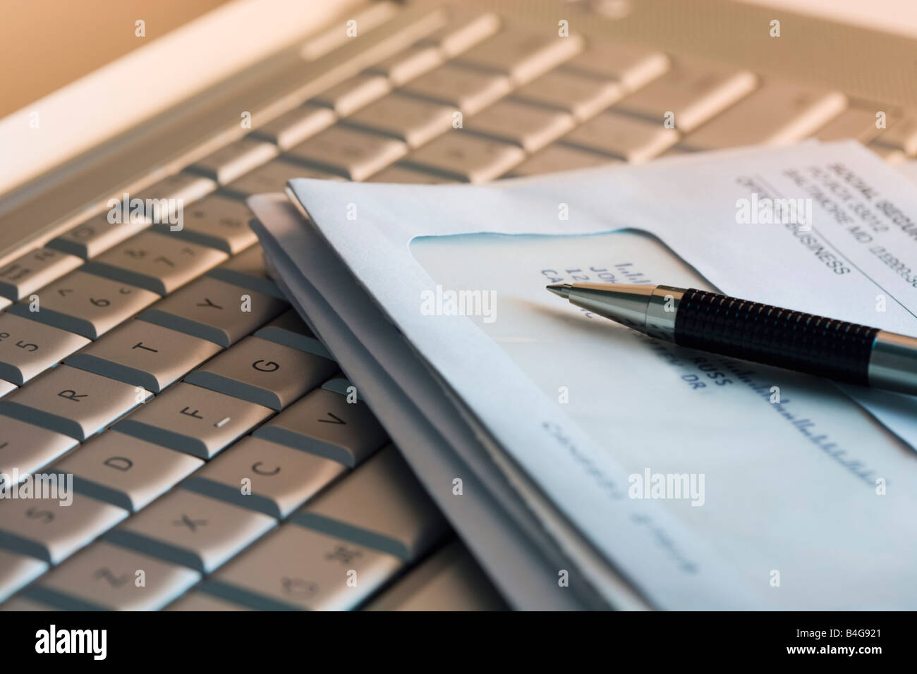 Keyboard of a computer and an envelope hi-res stock photography and ...