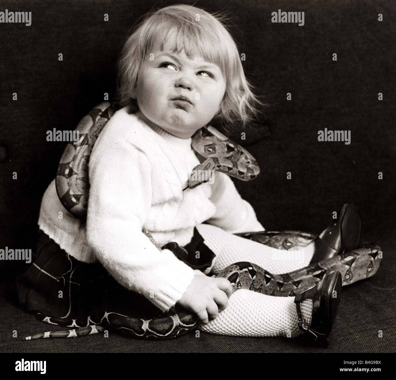 Girl with snake around her hi-res stock photography and images - Alamy