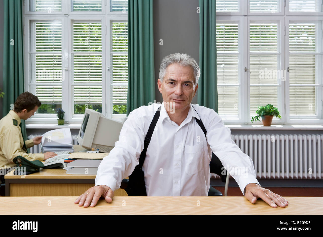 Two police officers working in an office Stock Photo - Alamy