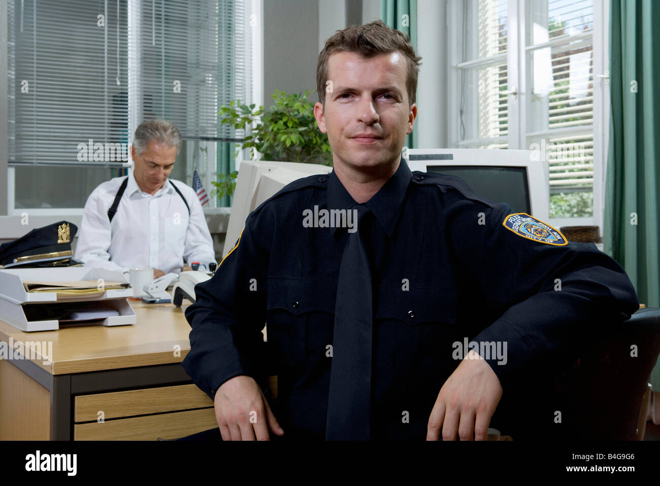 Police office badge hi-res stock photography and images - Alamy
